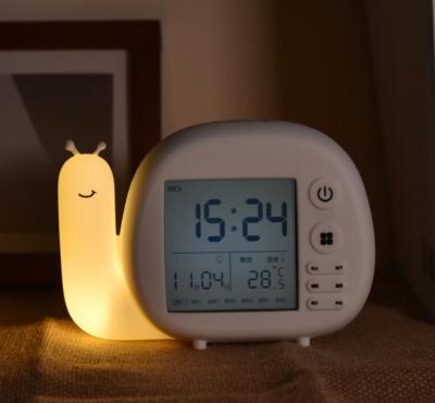 China Despertador das crianças do silicone do ABS de Kingda, pulso de disparo portátil da luz da noite da C.C. 5V Digitas à venda