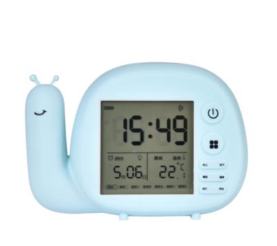China Despertador das crianças do silicone do ABS de Kingda, pulso de disparo portátil da luz da noite da C.C. 5V Digitas à venda
