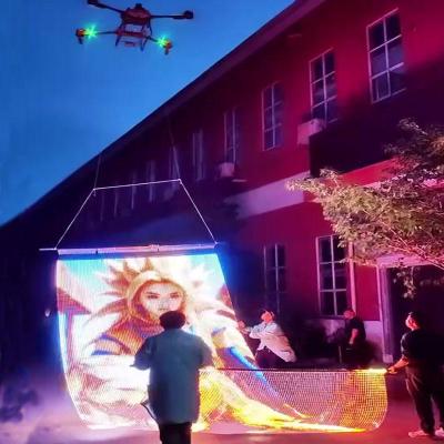 China Flying LED Display with Drone Magic Carpet Screen LED Film Screen Rechargeable for Outdoor Advertising Customized for sale