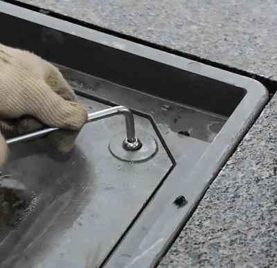 China Anti-theft GRP Manhole Cover with High Mechanical Strength and Lockable With Key for Secure Utility Access for sale