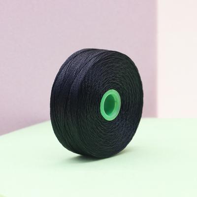 中国 ポリエステル結合糸縫製機械用アクセサリー Tex70 V69 ボビン収納箱 販売のため
