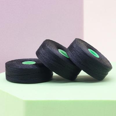 中国 ポリエステル結合糸縫製機械用アクセサリー Tex70 V69 ボビン収納箱 販売のため