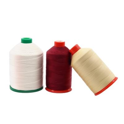 Cina 250 g di peso/fili di poliestere legati a cono Tex 45 Tex 70 Tex 90 per cuciture ad alta tenacità in vendita