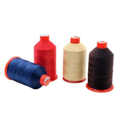 Cina 250 g di peso/fili di poliestere legati a cono Tex 45 Tex 70 Tex 90 per cuciture ad alta tenacità in vendita