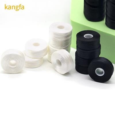 Cina 144pcs/Box Bianco/Nero 75D/2 100% poliestere bobine pre-rivolte fili L tipo lato meno in vendita
