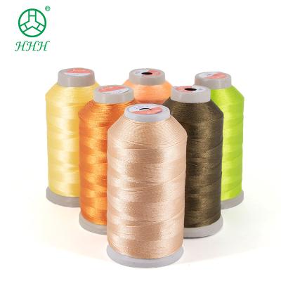 Cina Filato di poliestere Vietnam ricamo 120D 2 Alta resistenza 40 bobine accettato OEM/ODM Core Spun Yarn in vendita