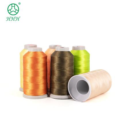 Cina Filato di poliestere Vietnam ricamo 120D 2 Alta resistenza 40 bobine accettato OEM/ODM Core Spun Yarn in vendita