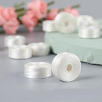 China 2cm Diameter Embroidery Bottom Thread White Borderless L-Type 75D/2 Shuttle Core Sewing Prefound Bobbin 6 for sale