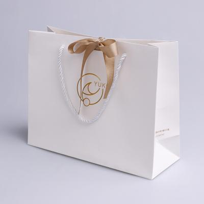China Creatrust Black Custom Logo Spice Shopping Your Own Tote Pocket Gift Retail Kraft Handle Dark Green Paper Bag for sale
