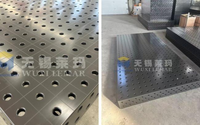Welding table close-up showing precision holes