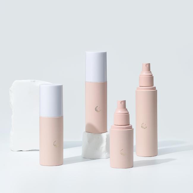 Close-up of cosmetic bottle pump and spray mechanisms