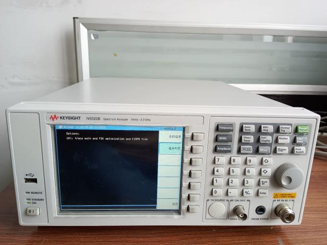 Close-up of Agilent N9320B Spectrum Analyzer display showing measurement results