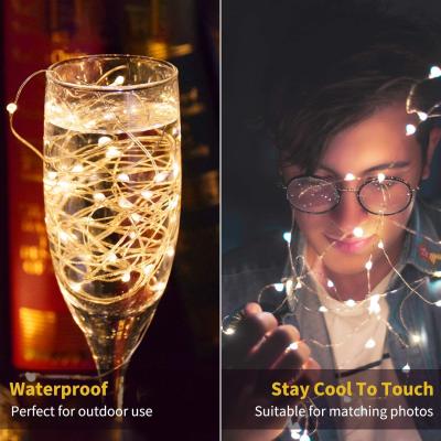 中国 IP65は豆電球の電池式のホタルのDIYの結婚式のための星明かりの月の光を導いた 販売のため