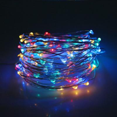 China Decorações impermeáveis a pilhas brilhantes do Natal do fio da prata do diodo emissor de luz das luzes de fada 60 para exterior interno à venda