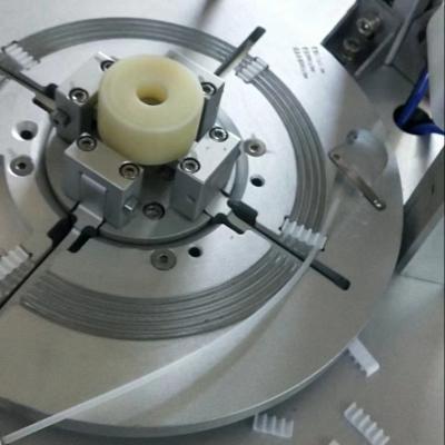China 0.4mm Medical Tube Coiling Packaging Machine Medical Guide Sheathing Coiling Machine for sale