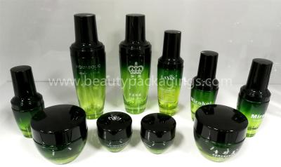 China Low MOQ Black-green Color Serum Cosmetic Bottle And Cream Jars for sale