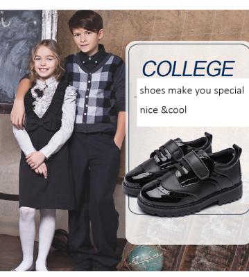 中国 黒い革平らな偶然の子供の学生服の靴 販売のため