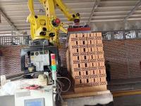 China Clay production line automatic unloading systems for fired bricks and packaging systems after unoading by robots for sale