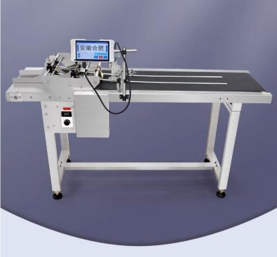 China Easy to Operate High Speed Full Automatic Card Paper Labels Plastic Bags Paging Machine for sale