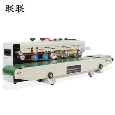 China Plastic Packaging Film Induction Heat Sealing Machine with 908* 392 *292mm Dimensions for sale