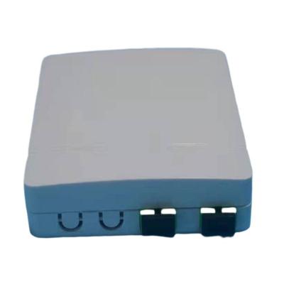 China FTTX Caja de salida de pared interior Mini Tipo SC LC SX DX APC/UPC Terminal de fibra óptica de puerto 2/4 en venta