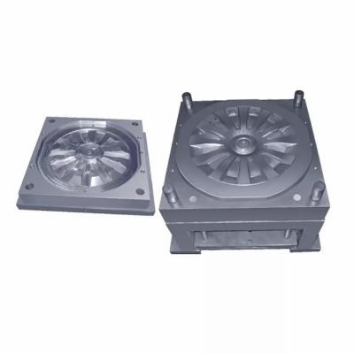 China Molde de encargo del moldeo por inyección de las piezas de la cubierta de rueda de la silla con el molde plástico material del moldeo a presión del ABS del PA PA6 PA66 en venta