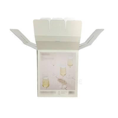 China Laminated Custom Folding Carton Box Full-Color Printed Tuck Style Closure Glass Bottle Gift Retail Packaging for sale