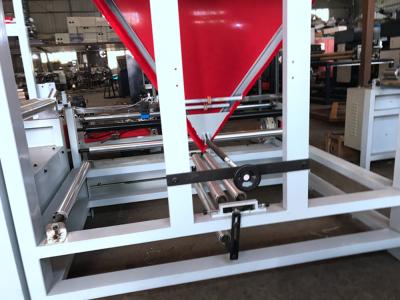 Cina Roll-to Roll Plastic film triangle folding and rewinding machine for PE HDPE LDPE PP BOPP OPP in vendita