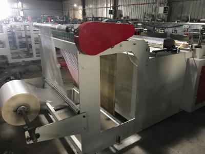 Cina Automatic Double layer Biodegradable plastic poly pe pp clothes cover garment bag cutting machine price in vendita