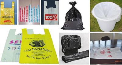 Cina 4 line garbage bag biodegradable vest  bag making machine in vendita