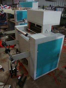 Cina High Speed plastic soft loop handle Cloth bag cutter machine price in vendita