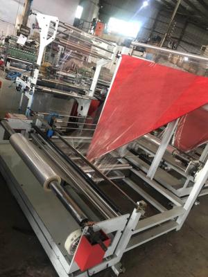 Cina High speed HDPE LDPE plastic film Folding and rewinding machine for bag roll side sealing bag good price in vendita