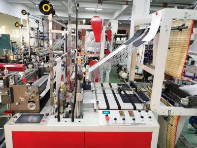 Cina High speed biodegradable plastic garbage shopping bag cutter machine price in vendita
