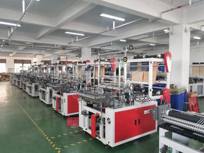 Cina Full automatic four lines high speed sealing and cutting  bag making machine shopping bag machine price in vendita