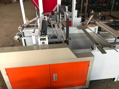 Cina PP/PE/OPP/BOPP plastic film triangle folding rewinding  side sealing machine in vendita