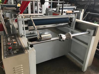 Cina PP/PE/OPP/BOPP plastic film triangle folding rewinding  side sealing machine in vendita