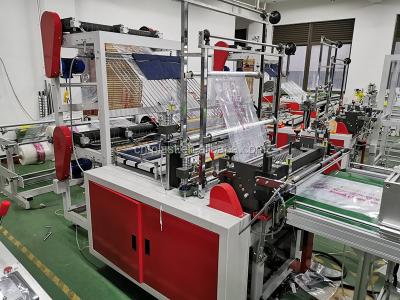 Cina Good price biodegradable plastic tshirt and flat bag cutter machine with conveyor belt in vendita