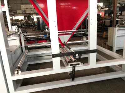 Cina High speed HDPE LDPE plastic film BOPP Folding and rewinding machine for bag roll side sealing bag in vendita
