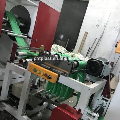 Cina Plastic  draw handle big garbage bag making machine to make ribbon through continuous  bag in vendita