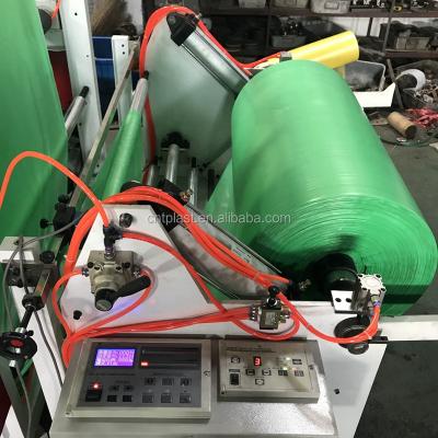 Cina Plastic  draw handle big garbage bag making machine to make ribbon through continuous  bag in vendita