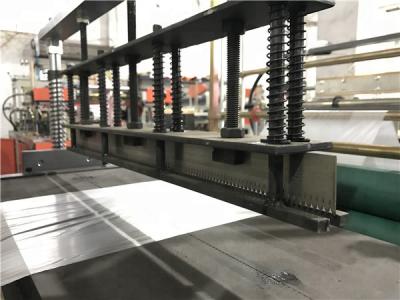 Cina High Speed Dot-break Continuous paper cored/coreless rolling bag making machine for T-shirt shopping bag Flat garbage bag Price in vendita