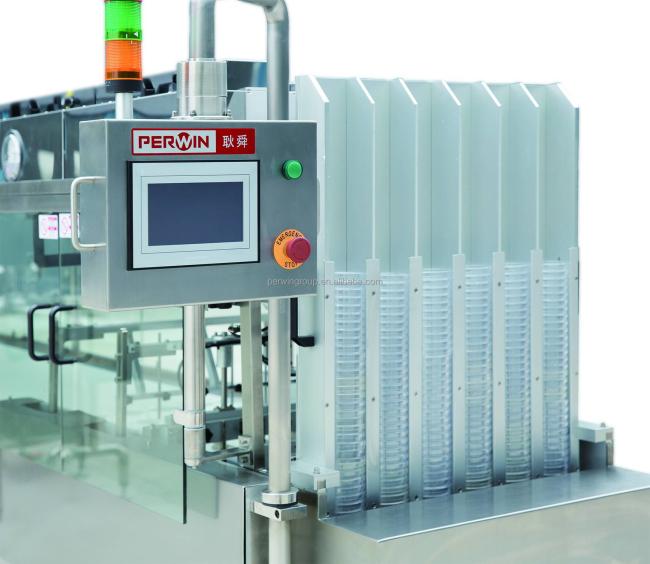 Close-up of Petri dish filling mechanism