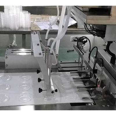 China Automatic Petri Dish Filling Machine 6000BPH with 440V Electric Drive for sale