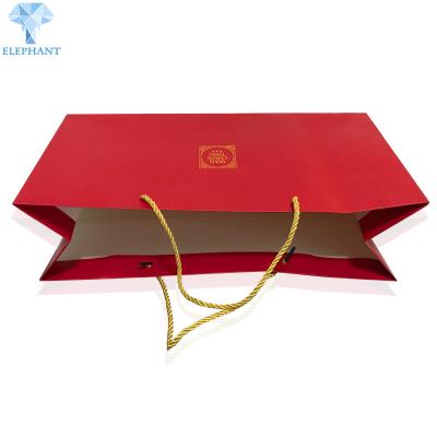 Cina Le borse rosse del regalo con le maniglie 18×13×7cm hanno riciclato le borse di carta delle mercanzie in vendita