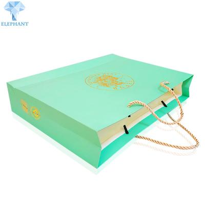 Cina C2S verde Art Paper Gift Bags With tratta biodegradabile in vendita