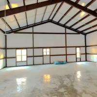 China Prefabricated Steel Structure Warehouse Building Large Span 30m Width Fast Assembly Garage for sale