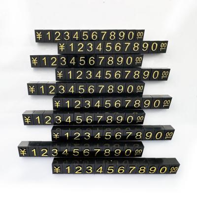 China L9*6mm 100set jewellery display price digital cube  Gold letters Black Background For Retail Shop display customizable for sale