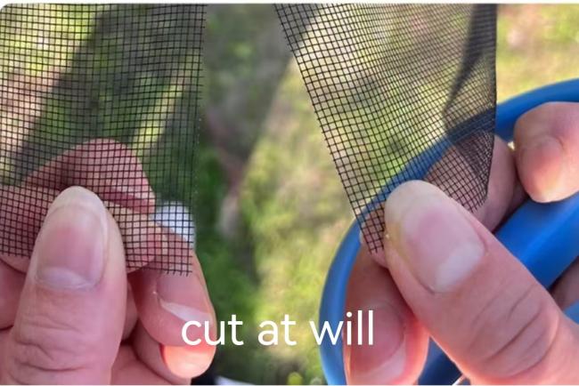 Fiberglass screen being cut to size