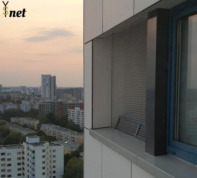 Bird protection netting installed on a structure