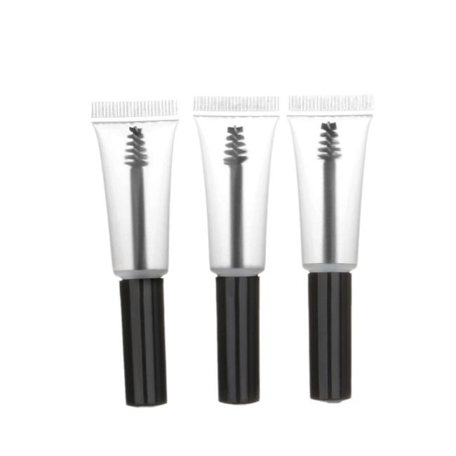 Clear plastic mascara tube with eyelash brush